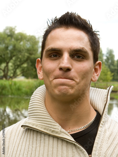 "Young Man with Impish Grin" Stock photo and royalty-free images on ...