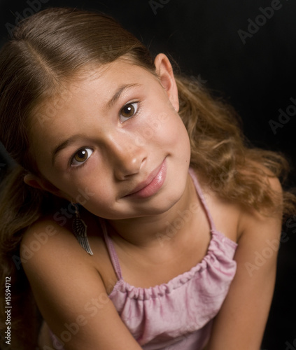 "Little girl smiling and looking up" Stock photo and royalty-free ...
