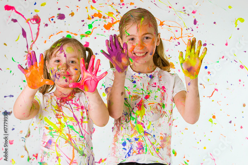 "Children with a messy painting project" Stock photo and royalty-free ...