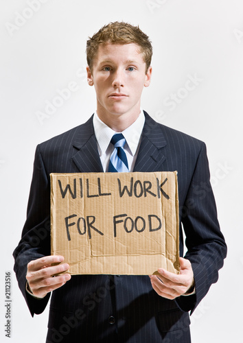"Businessman with sign will work for food" Stock photo and royalty-free ...