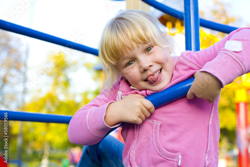 "Portrait of playful six-year girl in the playground" Stock photo and ...
