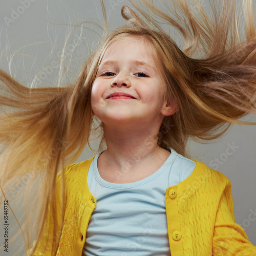 "Happy girl child with long blond hair." Stock photo and royalty-free ...