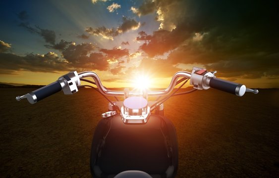 Motorcycle Riding Into Sunset