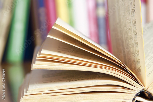 "book on the desk against books" Stock photo and royalty-free images on ...