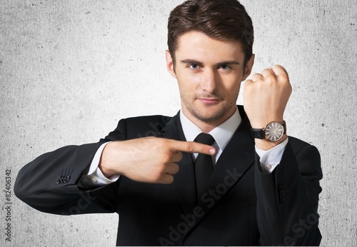 "Watch. Businessman showing the time on his wrist watch" Stock photo ...
