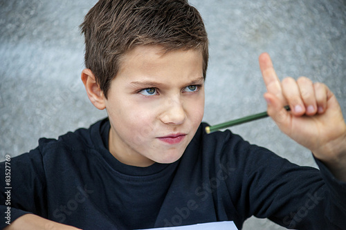 "Boy (10-11) refusing to do homework" photo libre de droits sur la ...