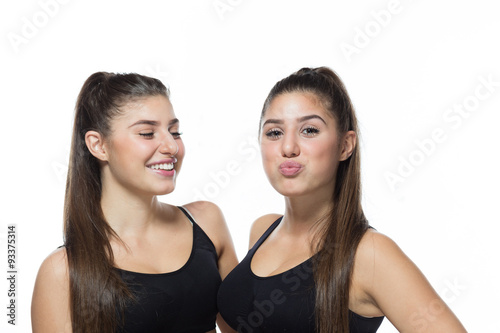 "Twin sisters kiss" Stock photo and royalty-free images on Fotolia.com ...