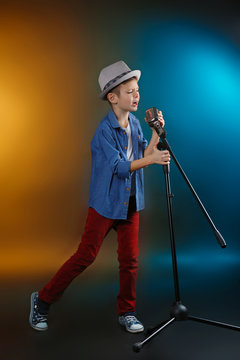 Boy Singing On Stage