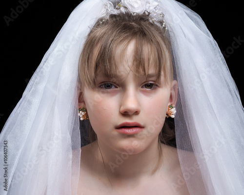"Teen girl - the bride. Portrait of a young, weeping bride. The concept ...