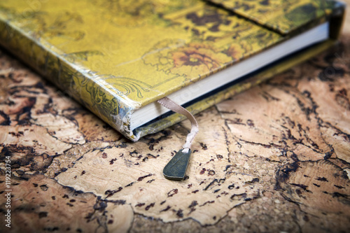 "Ancient notebook with records on an old background. Antiquarian books ...