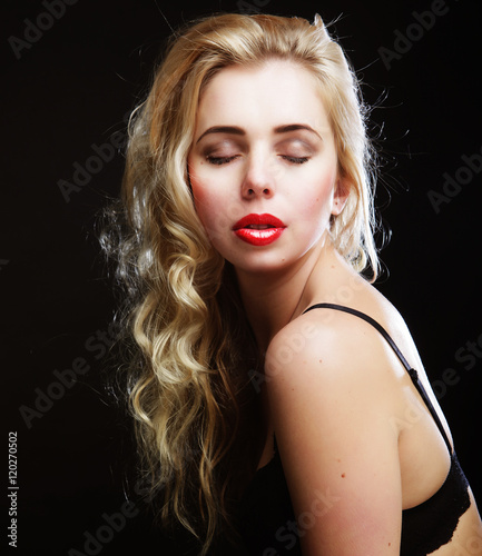 "blond woman with curly hair in black lingerie" Stock photo and royalty ...