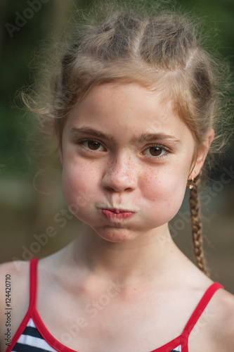 "Funny girl puffed out his cheeks" Fotos de archivo e imágenes libres ...