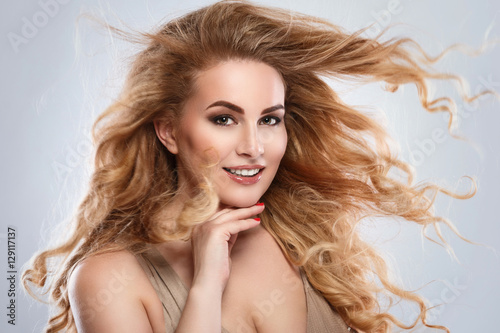 "Portrait of beautiful blonde woman with curly hair" Stock photo and ...