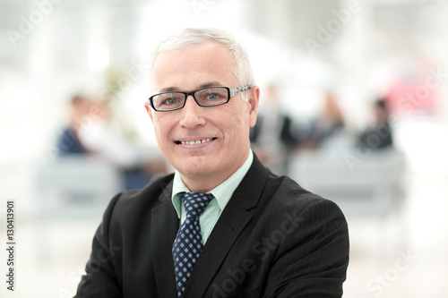 "Mature friendly white-haired businessman in a modern office" Stock ...