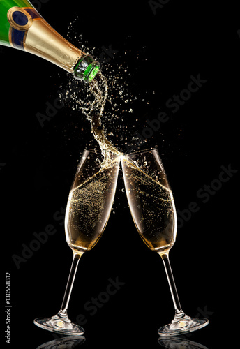 "Two glasses of champagne with bottle over black background" Stock ...