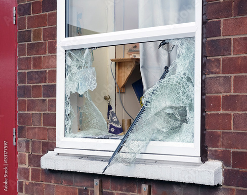 "Broken window caused by burglar breaking in to premisis to steal ...