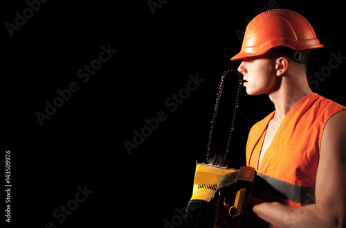 Sexy Man With Electrical Saw Portrait Of Aggressive Muscular Male Lumberjack Woodworker With