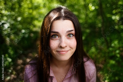 "Portrait of surprised smiling cute young woman with emotive wide-eyed ...