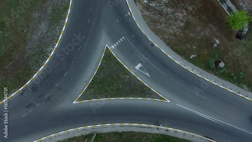 "Aerial Shot of a Triangle Highway Intersection With Cars and a Bicycle ...