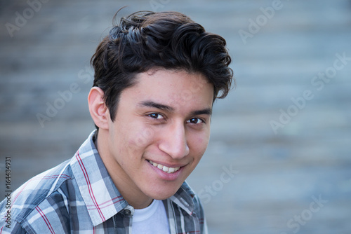 "Teenage Hispanic boy, smiling " Stock photo and royalty-free images on ...