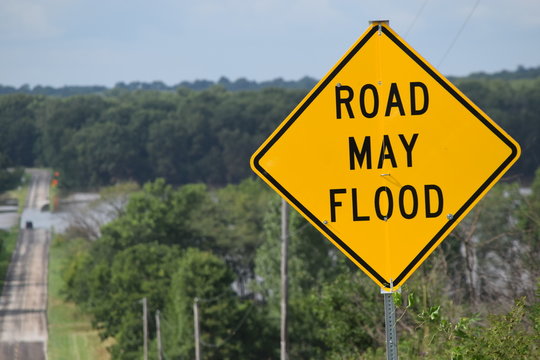 Road May Flood Sign