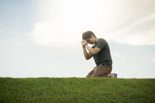 Man Kneeling In Prayer Images – Browse 3,267 Stock Photos, Vectors, and ...