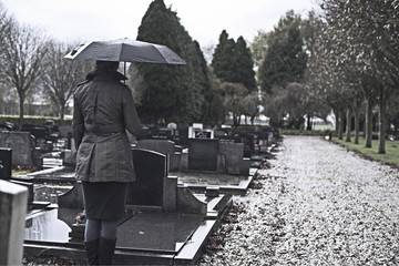 Search photos "woman, standing, cemetery, graveyard, rainy, rain, bad ...
