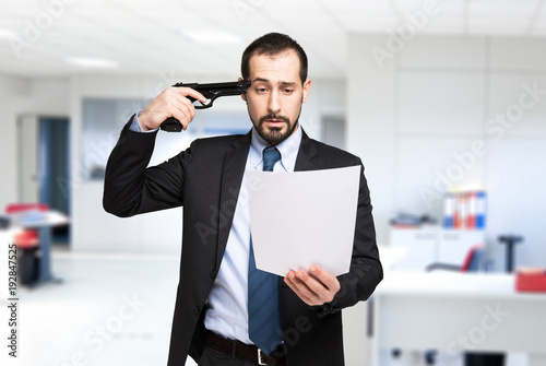 "Businessman pointing a gun to his head" Stockfotos und lizenzfreie ...