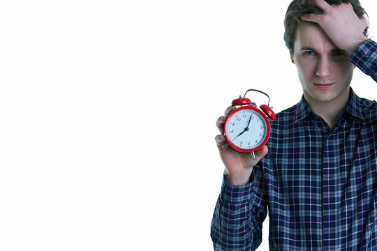 Red Vintage Alarm Clock in Hand Symbolizing Time Management