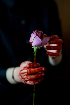 Bleeding Hand With Rose