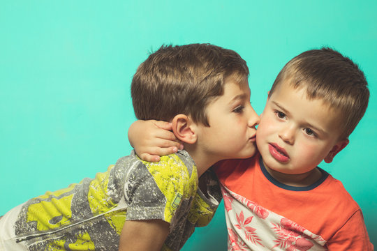 Two Little Boys Kissing