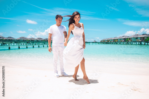 "Young couple in love at their honeymoon. Summer exotic vacation sexy ...