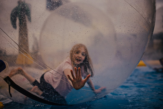 Girls In Giant Plastic Bubble