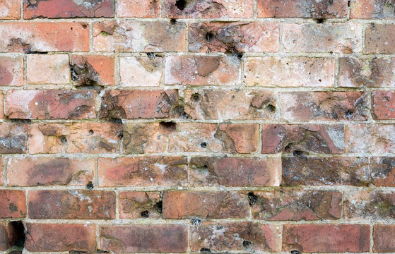 Bullet Holes In Brick Wall