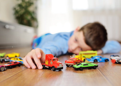 Kids Playing With Toy Cars