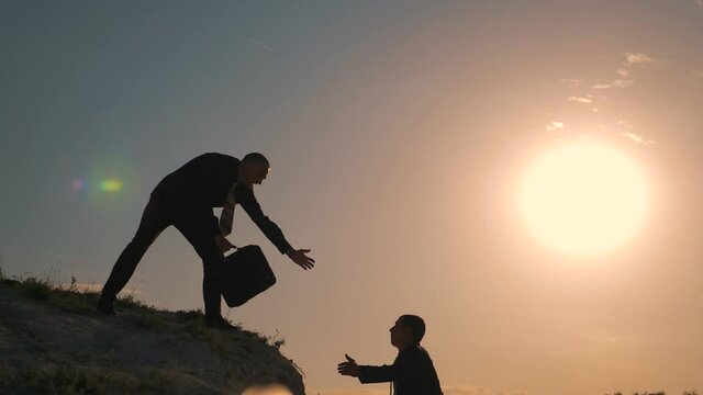 People Helping People Climb A Mountain Images – Browse 14,646 Stock ...