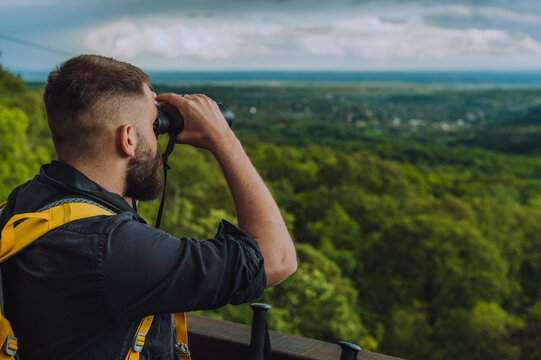 Man Using Binoculars Images – Browse 7,357 Stock Photos, Vectors, and ...