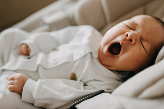 Yawning Newborn Baby
