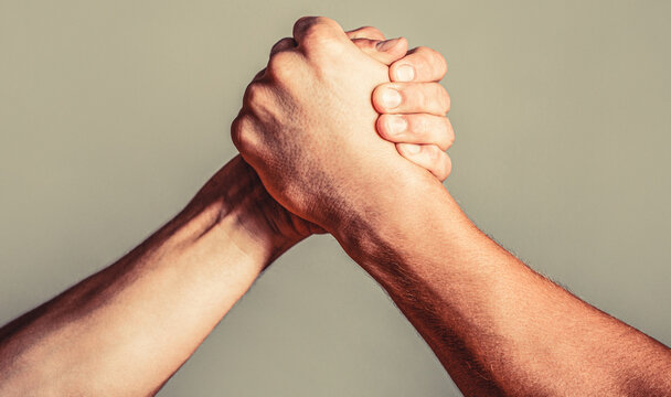 Two Muscle Men Handshake