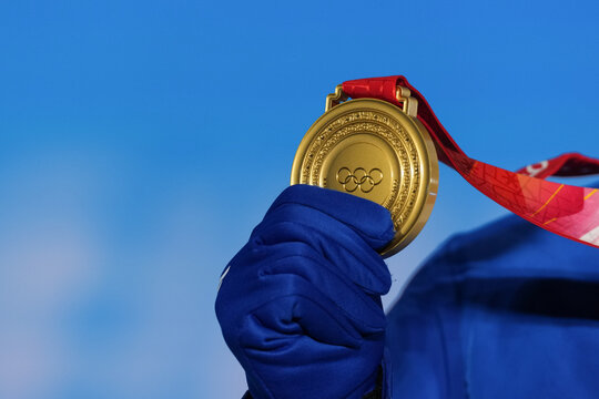 Person Go For Gold Medal