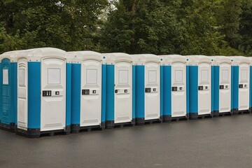 Toilets installed at a public event printed onto glass printed glass ...
