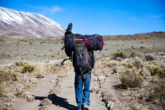 Man Carrying Heavy Rock Images – Browse 868 Stock Photos, Vectors, and ...
