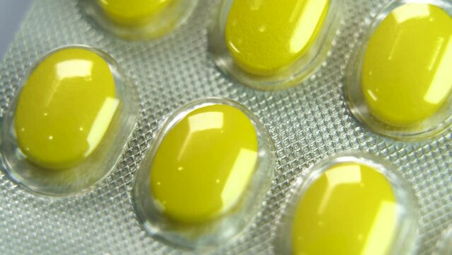 Small Yellow Oval Pill