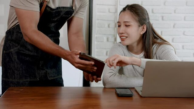 Shopkeeper Working On Calculator Images – Browse 91 Stock Photos ...