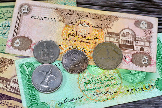 Uae Dirham Currency Notes In His Hands And An Old • Wall, 03/21/2023