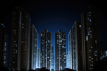 Modern High-Rise Building Illuminated at Night with Architecturally ...
