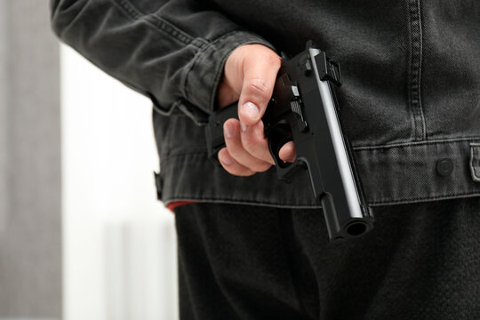 Man With Gun Back Images – Browse 13,408 Stock Photos, Vectors, and ...