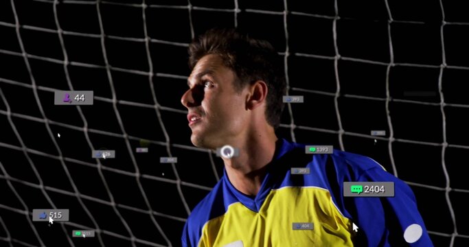 Soccer Goalkeeper with Digital Engagement Icons at Night Stadium - Free ...